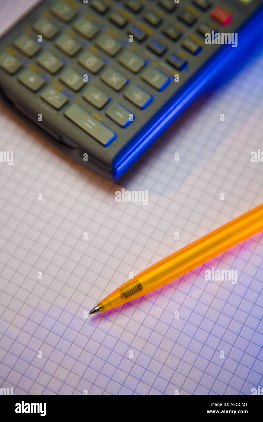 Pen and Calculator Stock Photo - Alamy