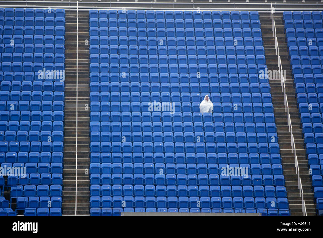A fan alone in an empty stadium Stock Photo - Alamy