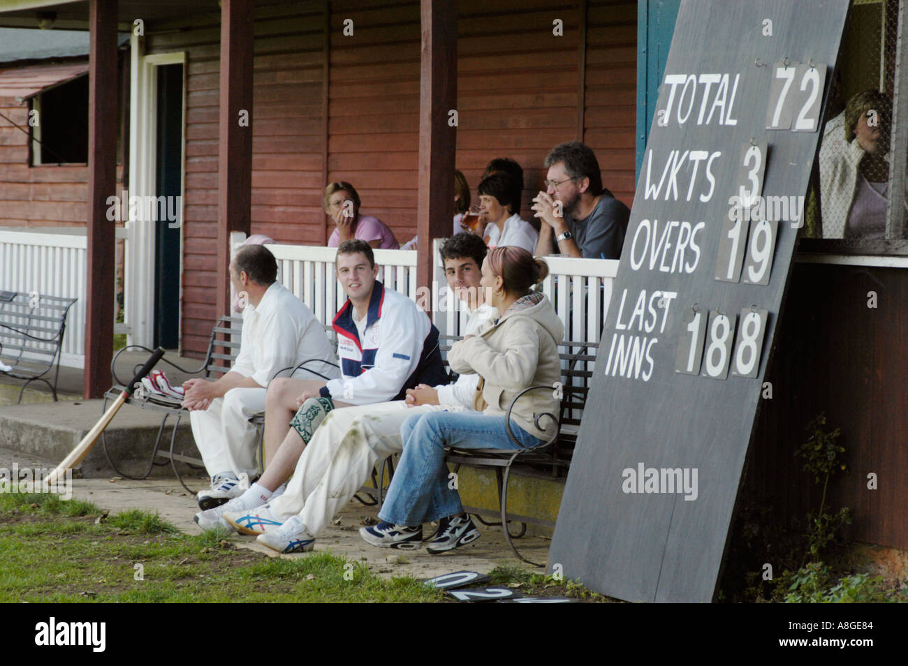 Village cricket and the waiting crowd outside the pavilion Stock Photo ...