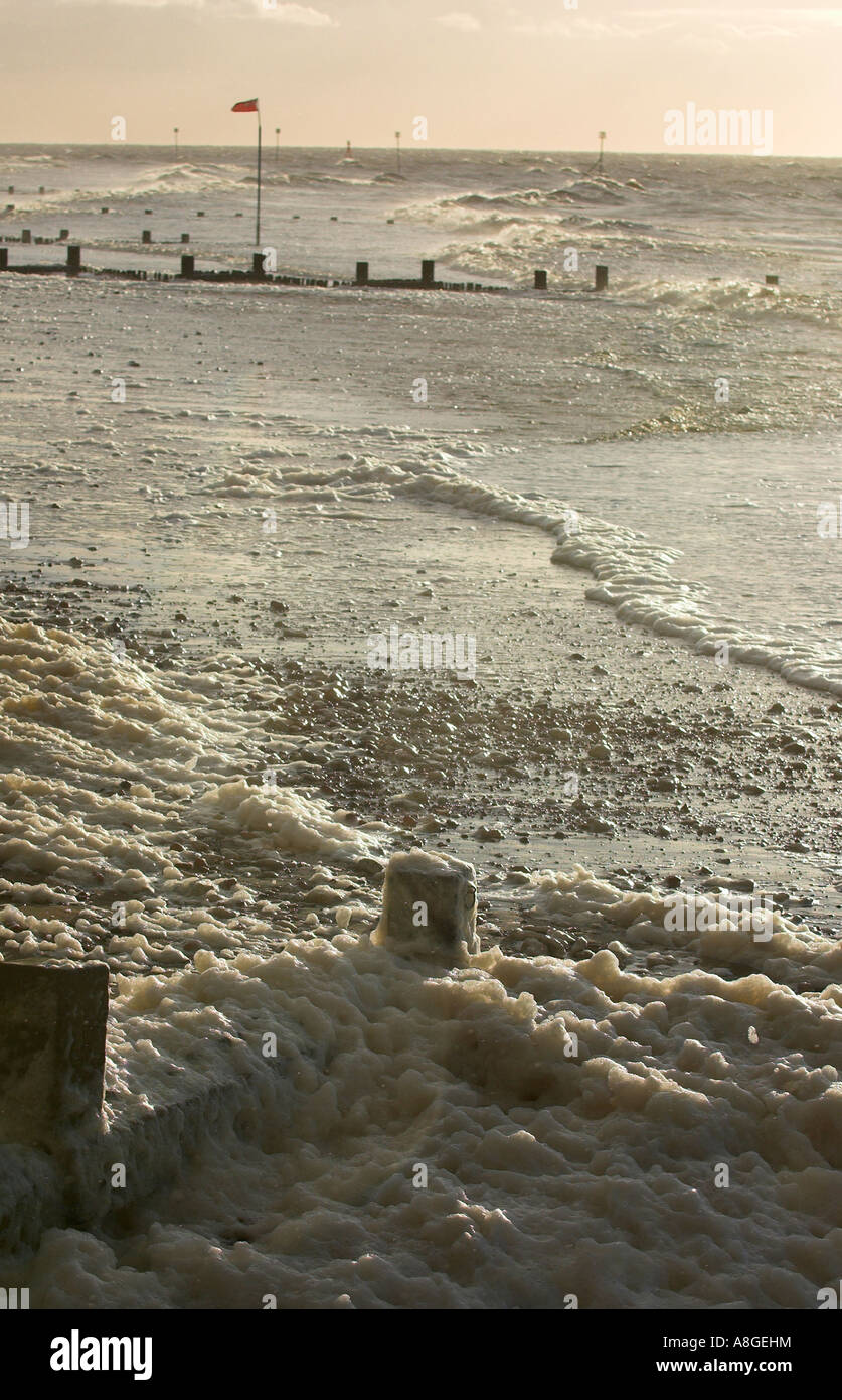 Foam washed up on groyne on beach at Hunstanton Stock Photo - Alamy