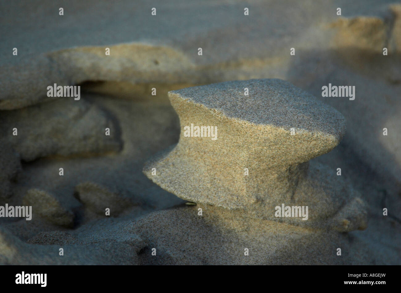 Wind sculpted sand on the beach Stock Photo - Alamy