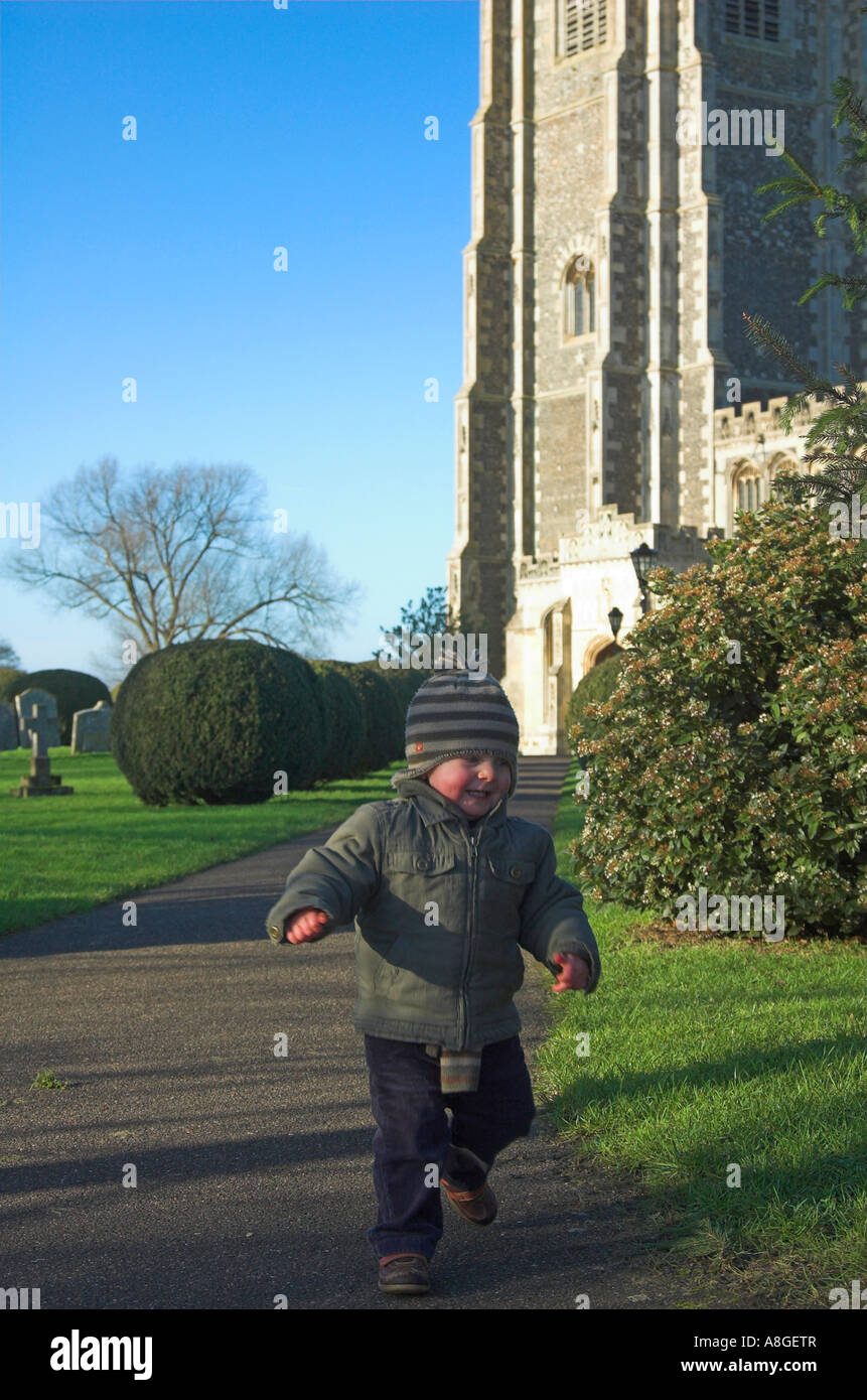 Boy running down path hi-res stock photography and images - Alamy