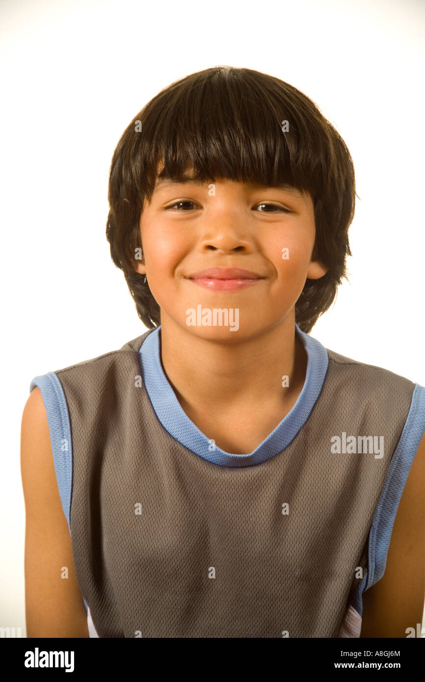 An 8 year old Chinese American boy smiles at home in California Stock ...