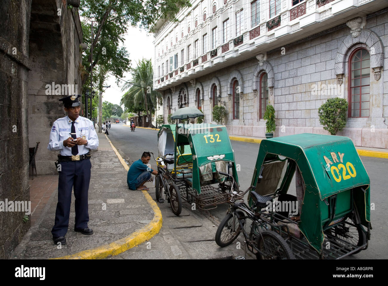 Security Guard and Pedicabs, Intramuros, Manila, Philippines Stock ...