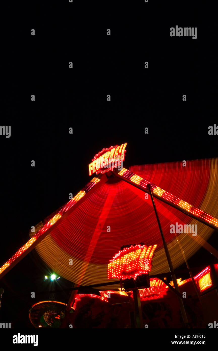 Carnival midway ride in motion Stock Photo - Alamy