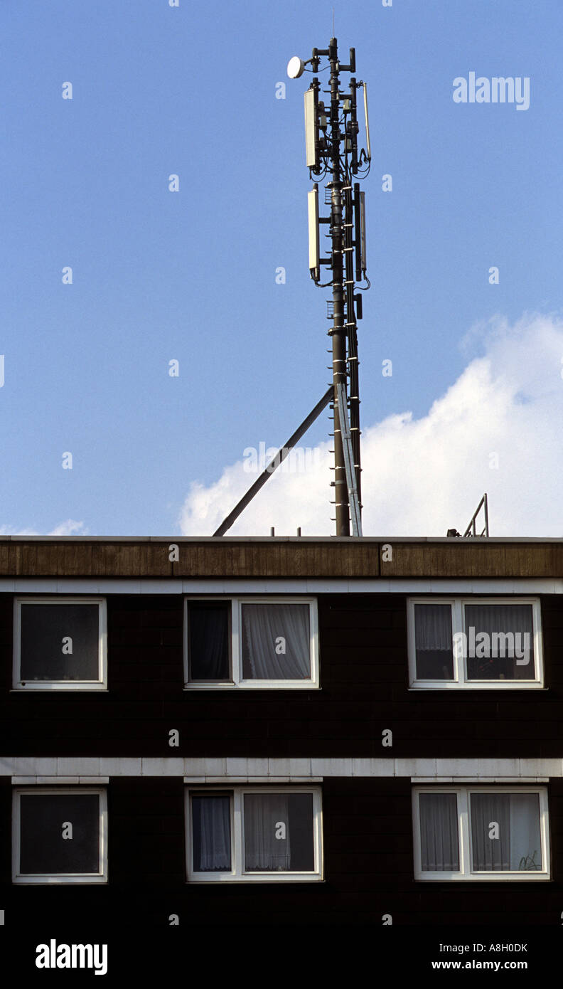 Mobile telephone mast on the roof of residential apartments in ...