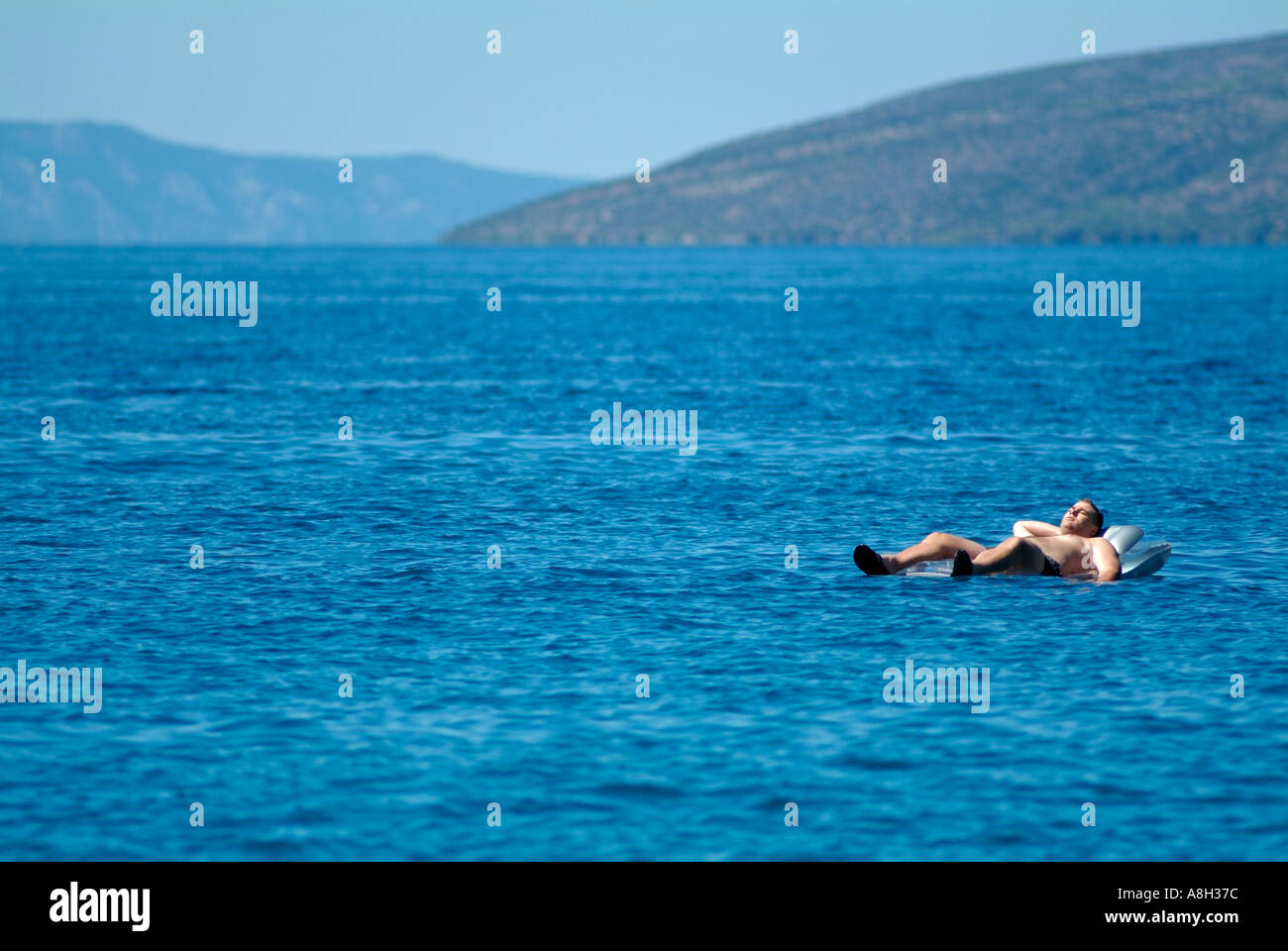 Holidaymaker Floating on a Lido in the Adriatic Sea off the Coast of ...