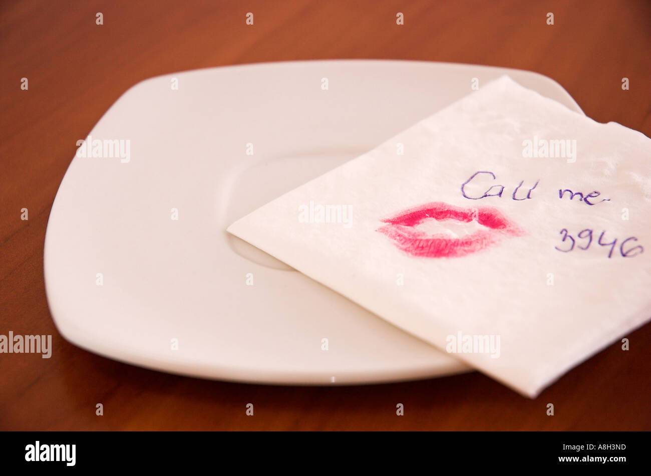 Lipstick mark and message written on tissue close up Stock Photo - Alamy