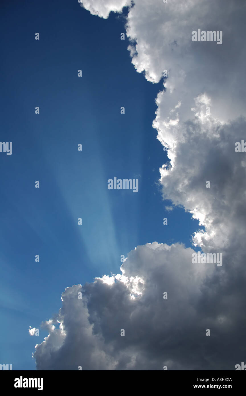 Sun Rays from Behind Clouds Stock Photo - Alamy