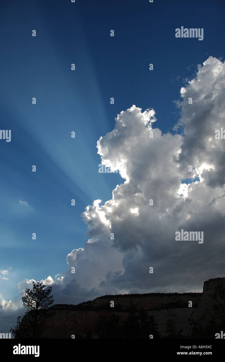 Sun Rays from Behind Clouds Stock Photo - Alamy