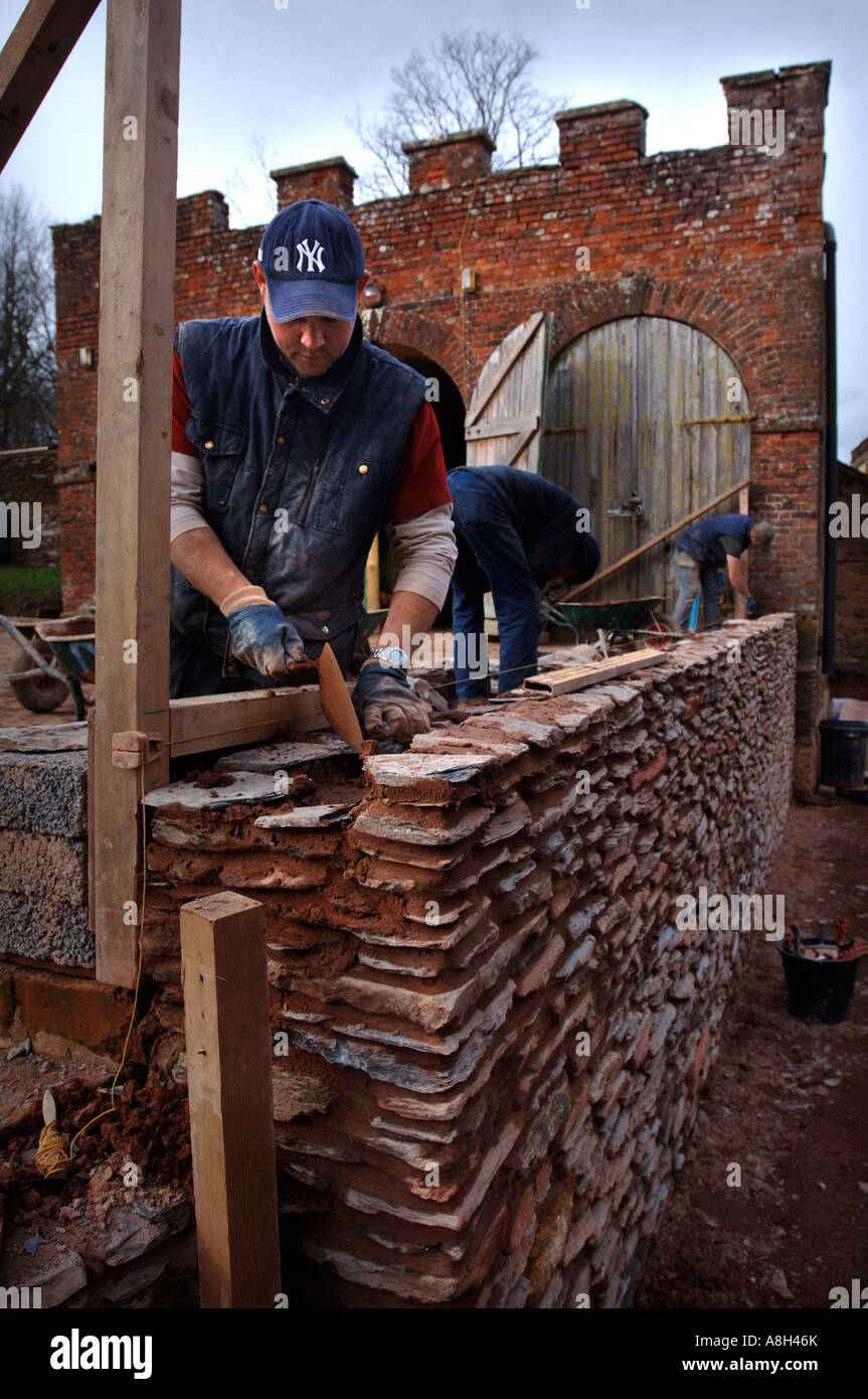 BUILDING A TRADITIONAL MORTE SLATE WALL IN FRONT OF A CASTELLATED ...