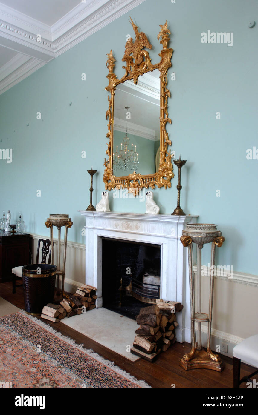 THE FIREPLACE WITH GILDED MIRROR IN THE BALLROOM AT HALSWELL HOUSE NEAR ...