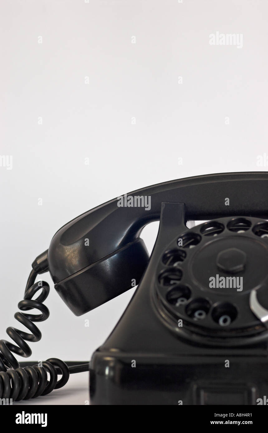 Black telephone with rotary dial close up Stock Photo - Alamy