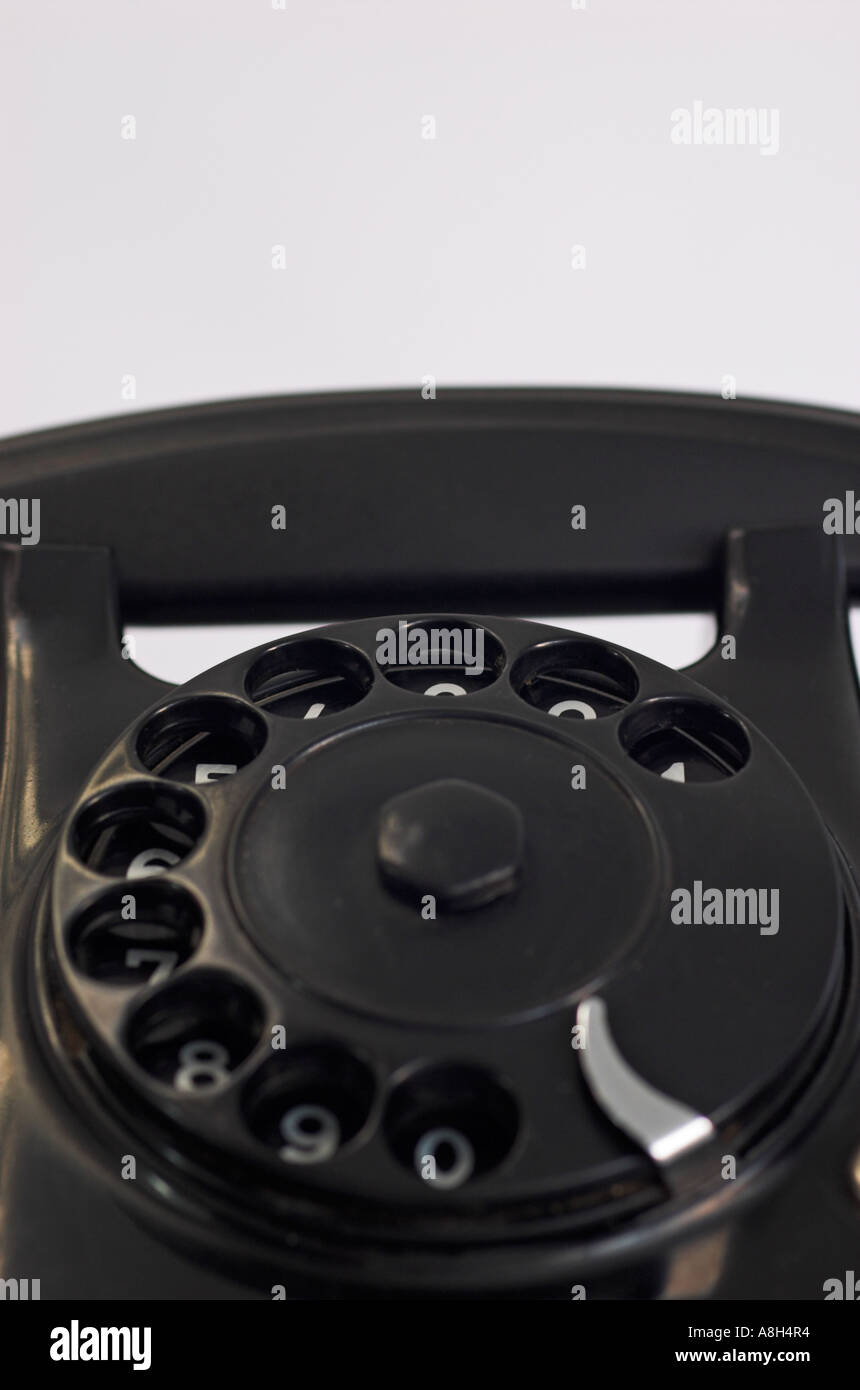 Black telephone with rotary dial close up Stock Photo - Alamy