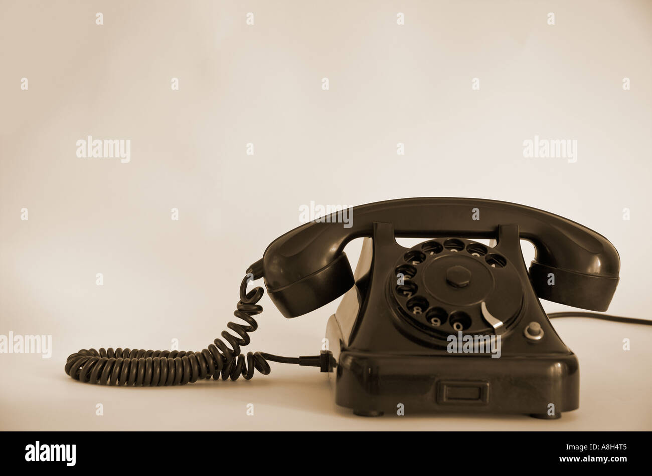Black telephone with rotary dial close up Stock Photo - Alamy