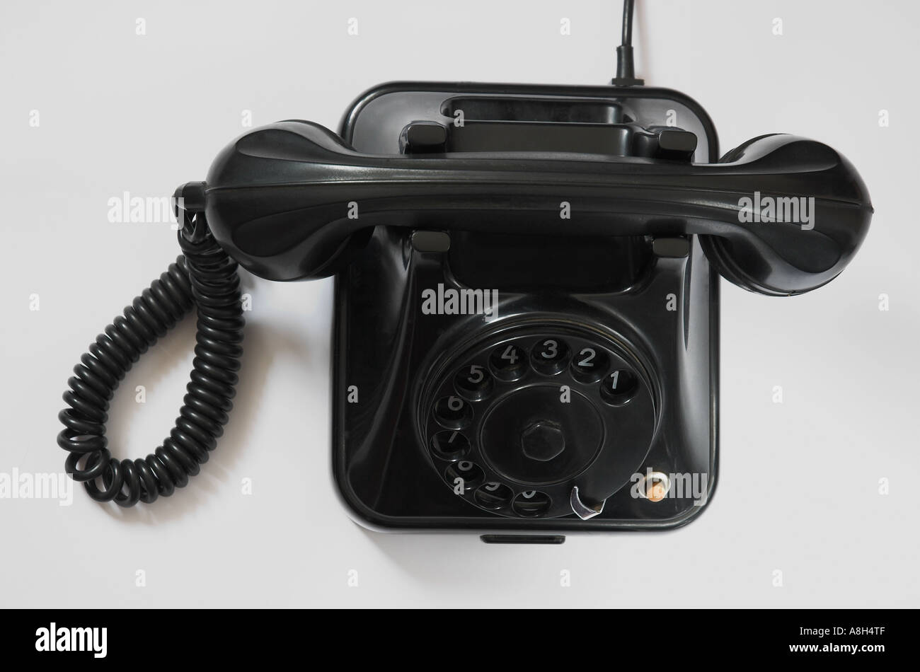 Black telephone with rotary dial elevated view Stock Photo - Alamy