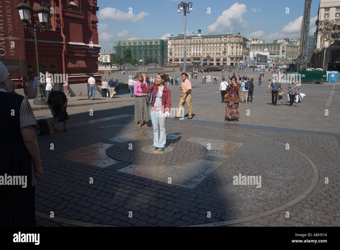 Teenage Girl Tossing Coin Over Her Back at Center of Moscow Circle ...