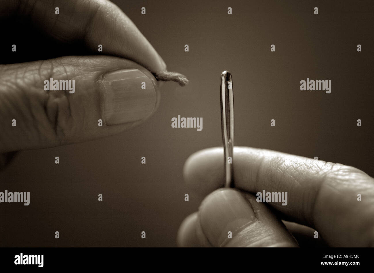 Threading Needle Stock Photos & Threading Needle Stock Images - Alamy