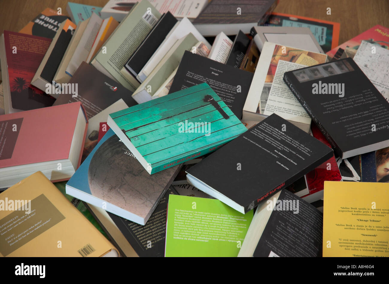 Books on floor Stock Photo - Alamy