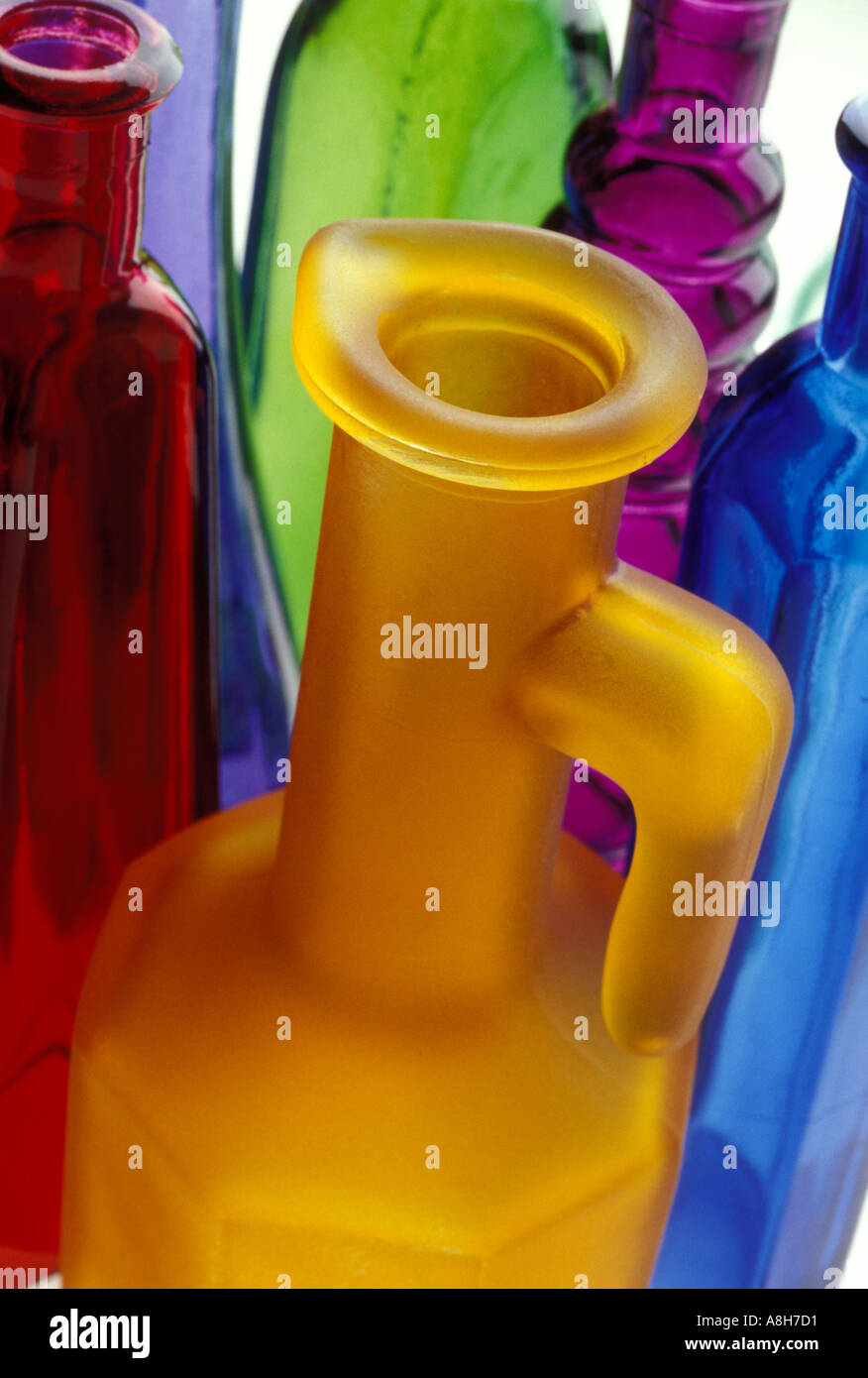 An assortment of colored bottles Stock Photo - Alamy