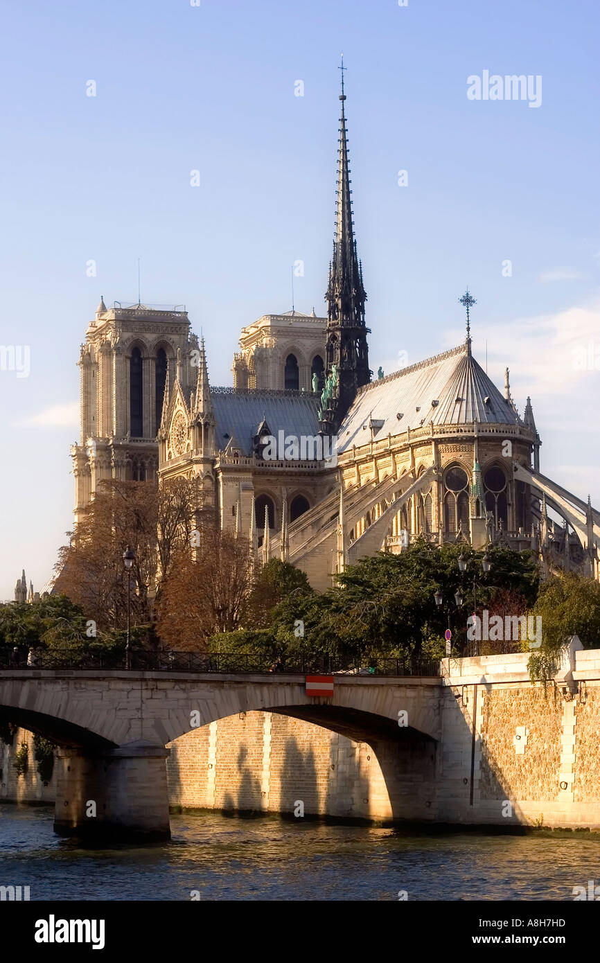 Back view of Notre Dame cathedral slightly before dusk - Paris, France ...