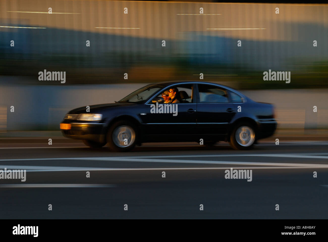 Car with blurred speed in Scheveningen Stock Photo - Alamy