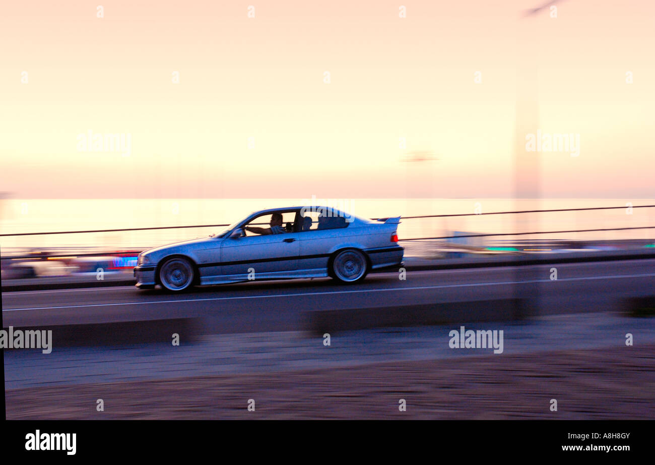 Car with blurred speed in Scheveningen Stock Photo - Alamy