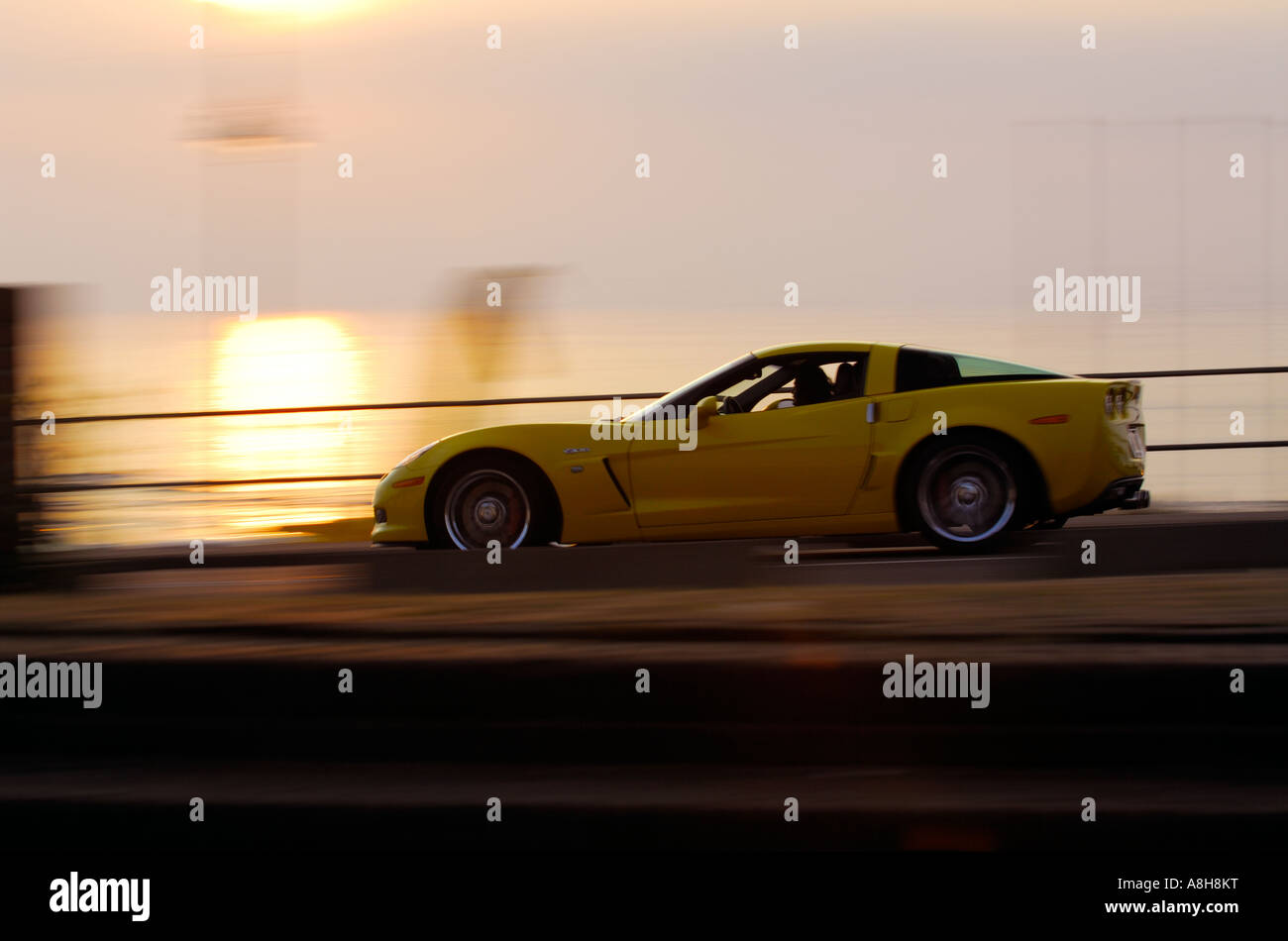 Fast driver Scheveningen sunset Stock Photo - Alamy