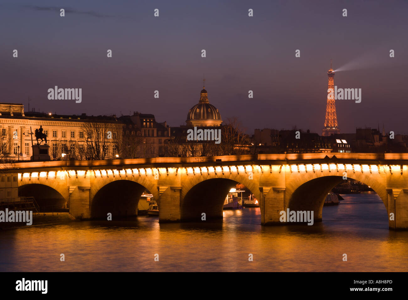 Night view of Le Pont Neuf new bridge over the Seine river with the ...
