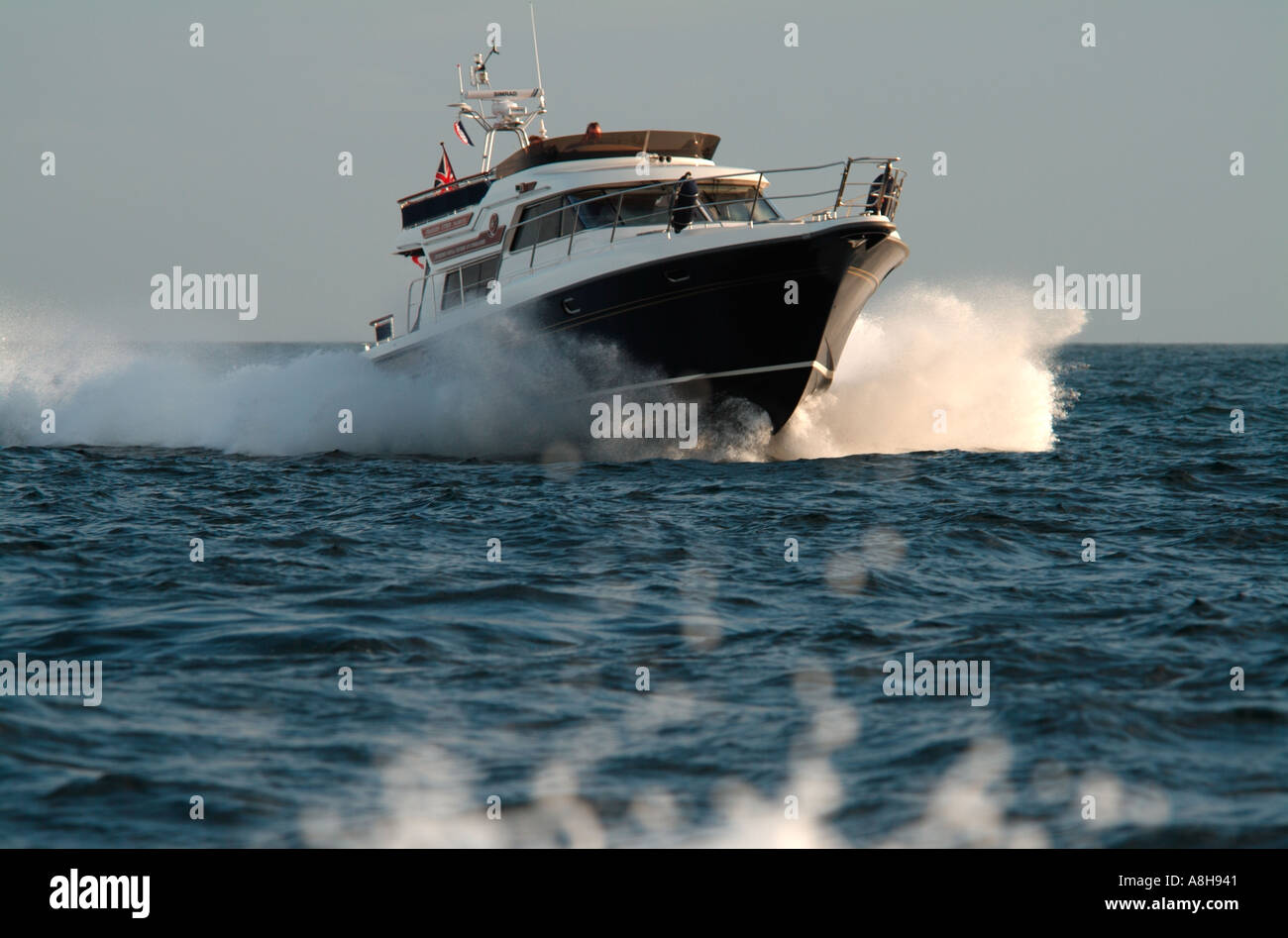 Running shot Storebro 475 Royal Commander motor cruiser Stock Photo - Alamy