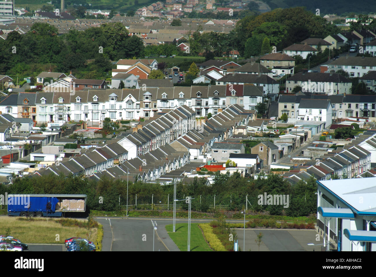 Suburbs of Merthyr Tydfil looking down semi aerial view new industrial ...