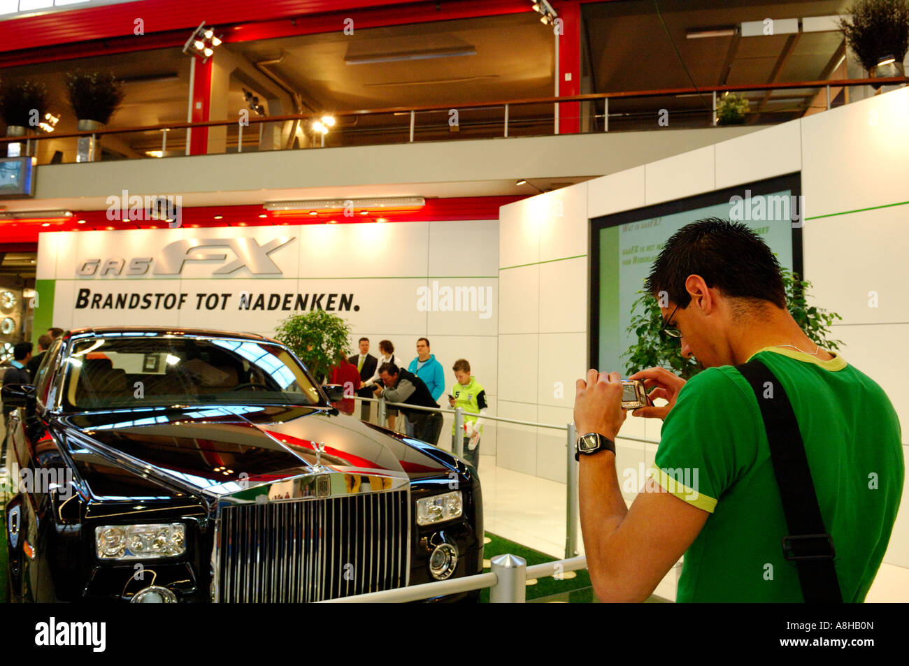 Amsterdam RAI Convention Centre 2007 Auto show boy take picture Stock ...