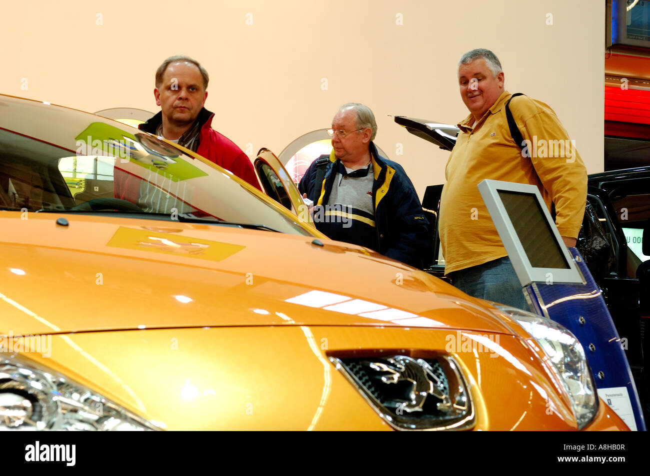 Amsterdam RAI Convention Centre 2007 Auto show Peugeot visitors looking ...