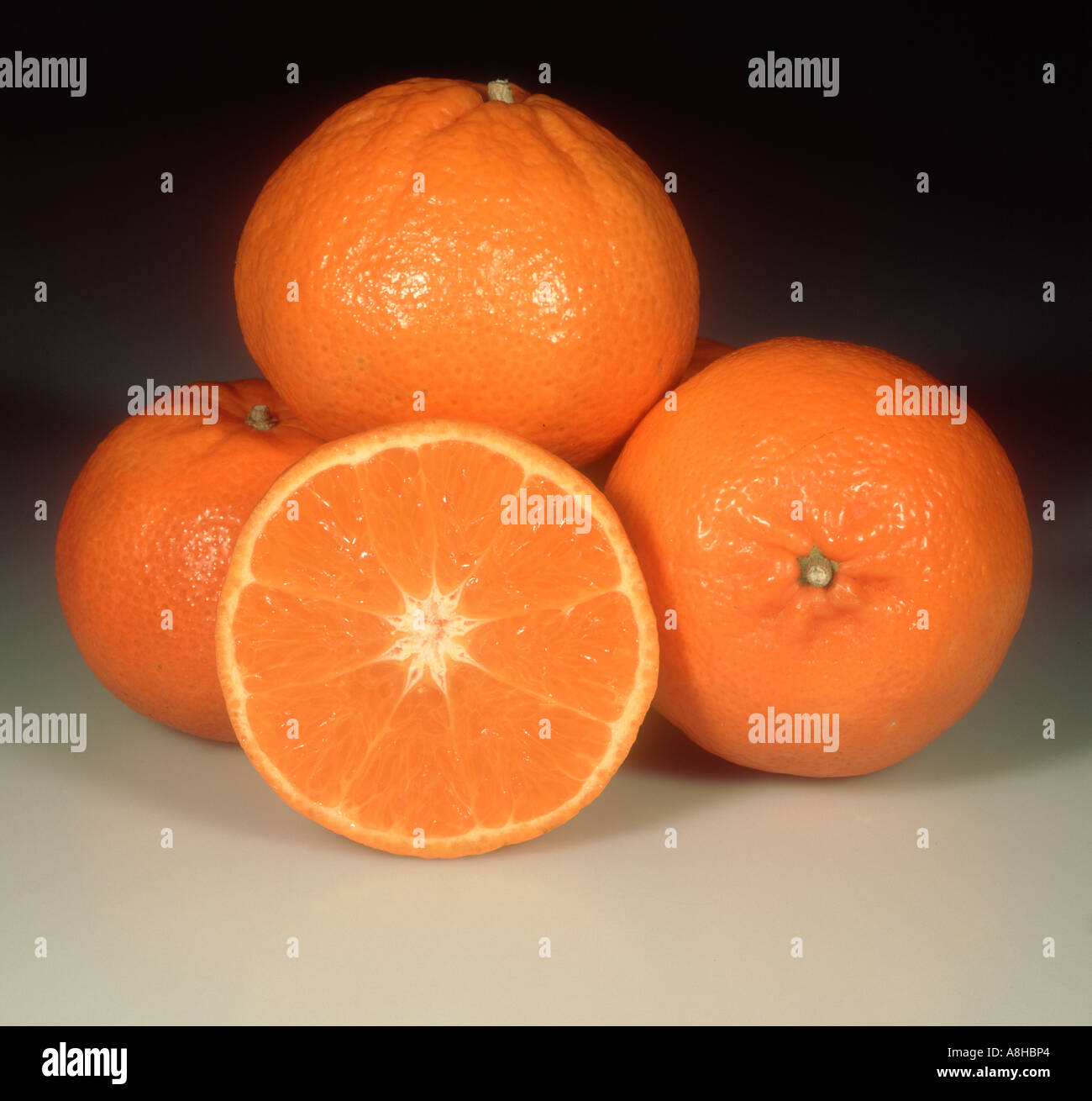 Group of mandarin fruit whole sectioned variety Or or Orah Stock Photo ...