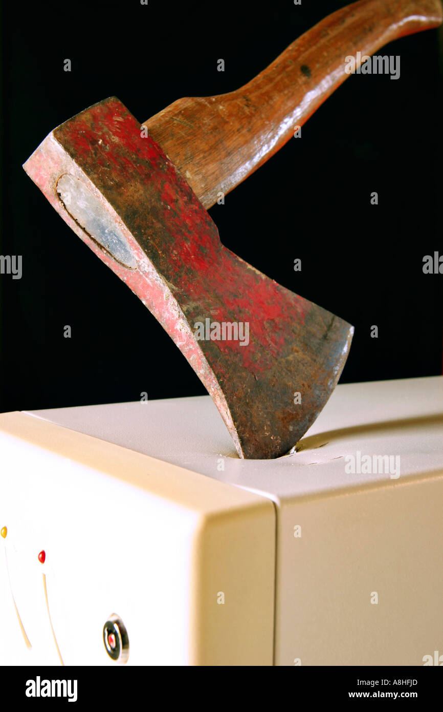 Computer with axe Stock Photo - Alamy