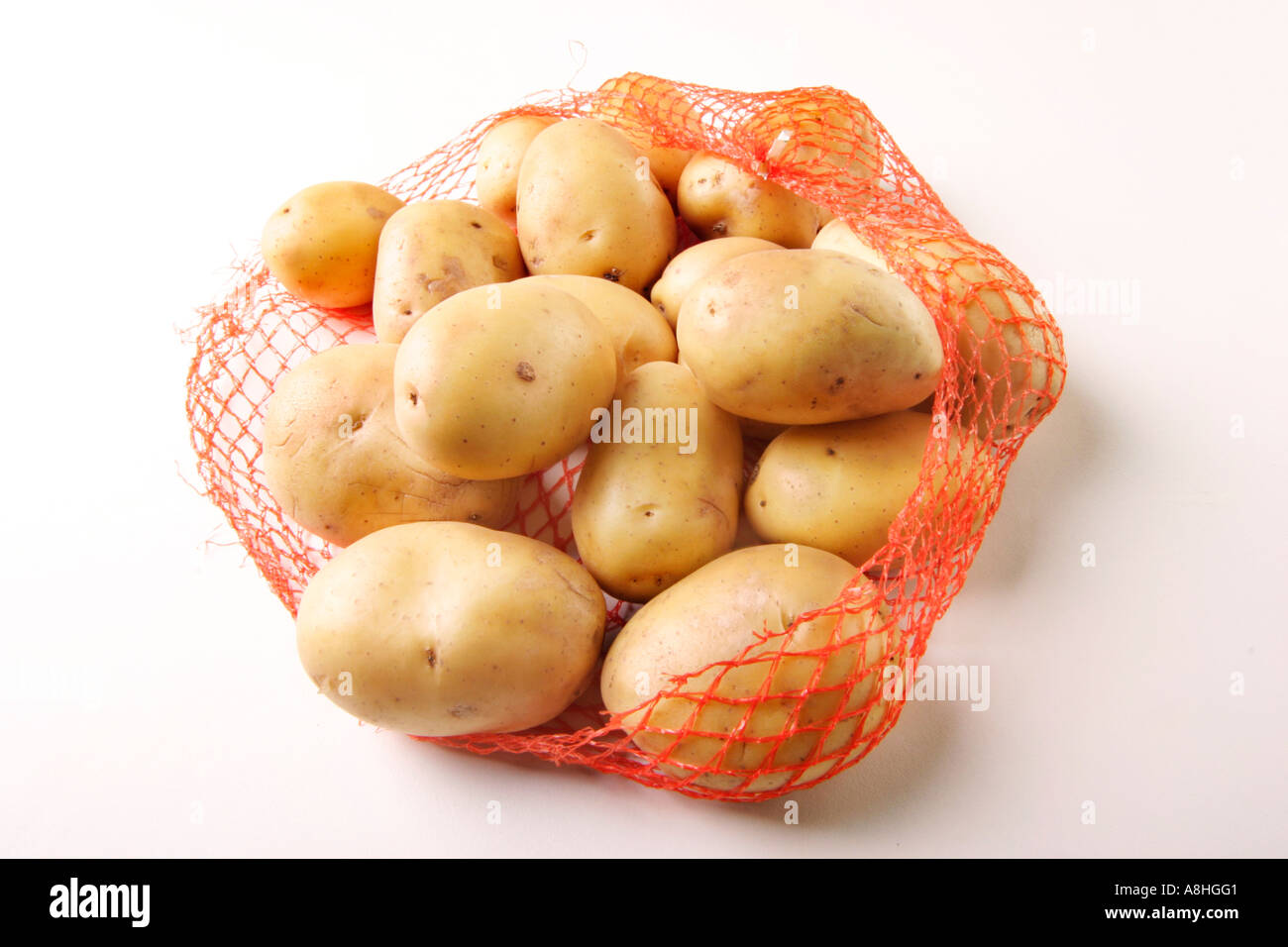Potatos in a platic package Stock Photo - Alamy