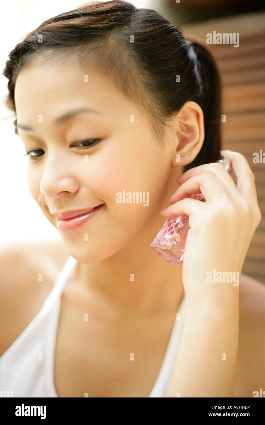 Woman with a spray Stock Photo - Alamy