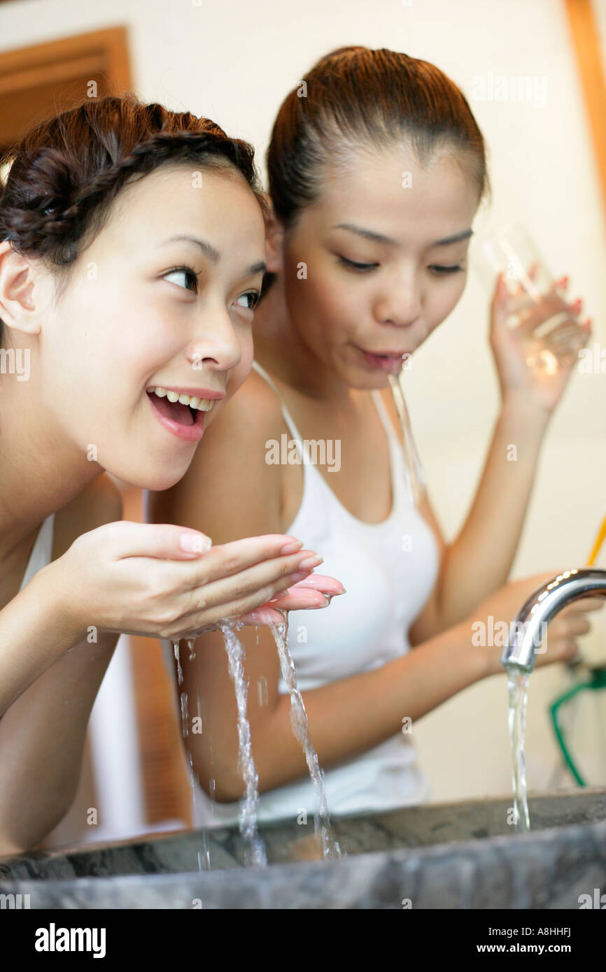 Women spiting and washing her face Stock Photo - Alamy