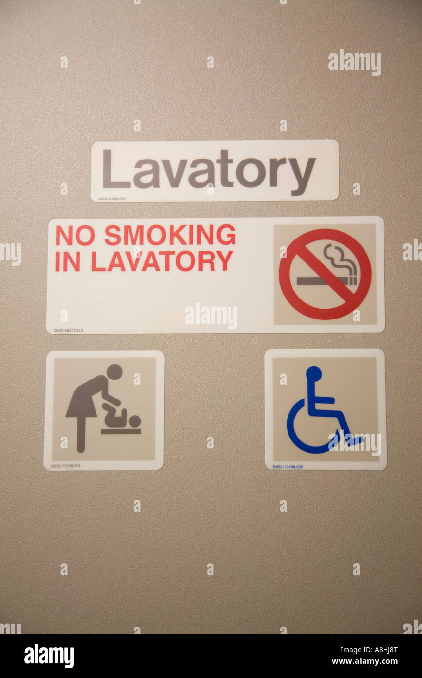 Pictogram on toilet door lavatory inside airplane Stock Photo - Alamy