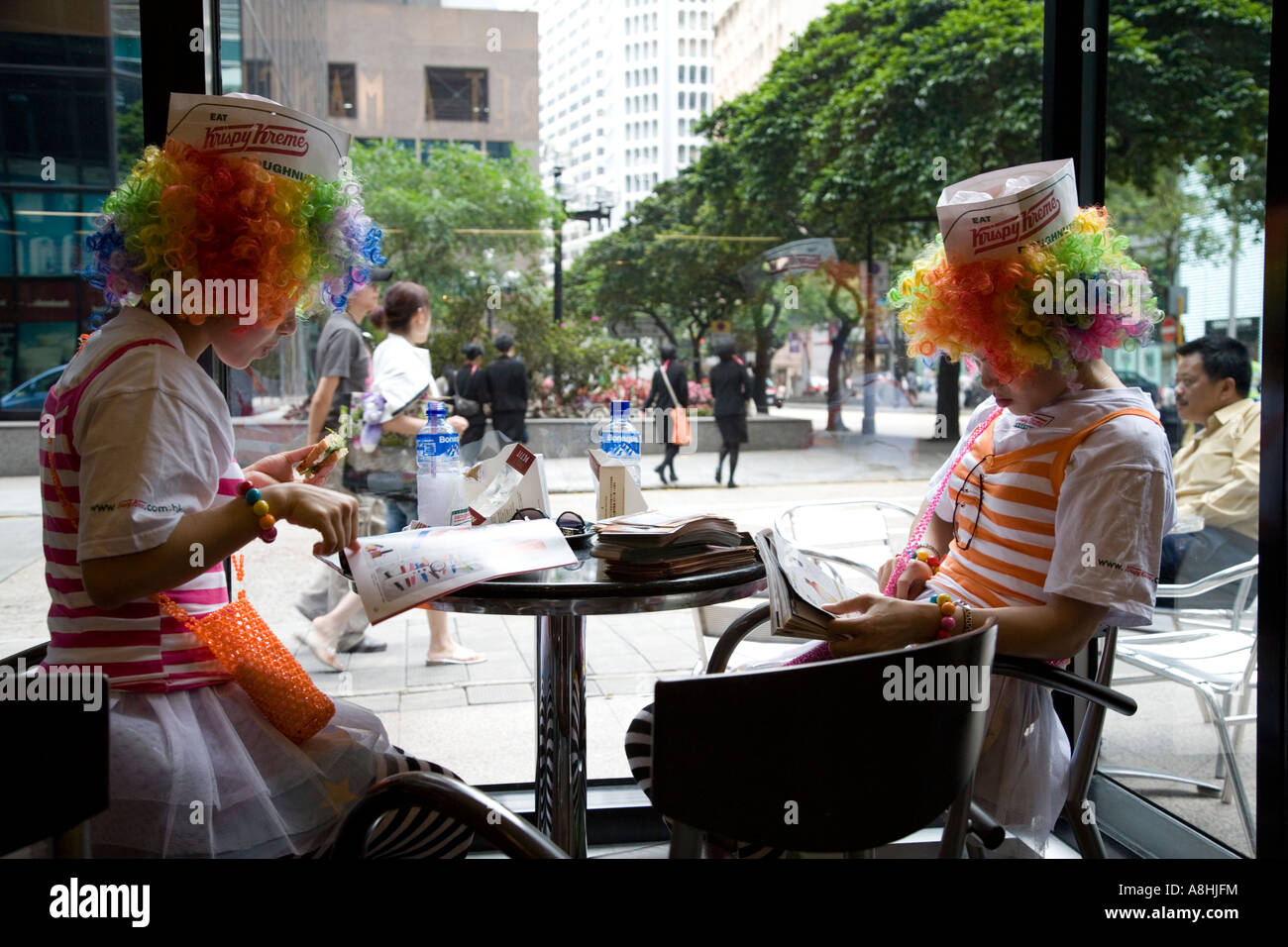 Lunch Break, girls in promotion outfit, Hong Kong Stock Photo - Alamy