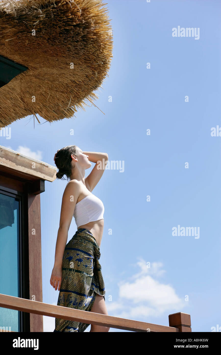 Low angle view of a young woman Stock Photo - Alamy