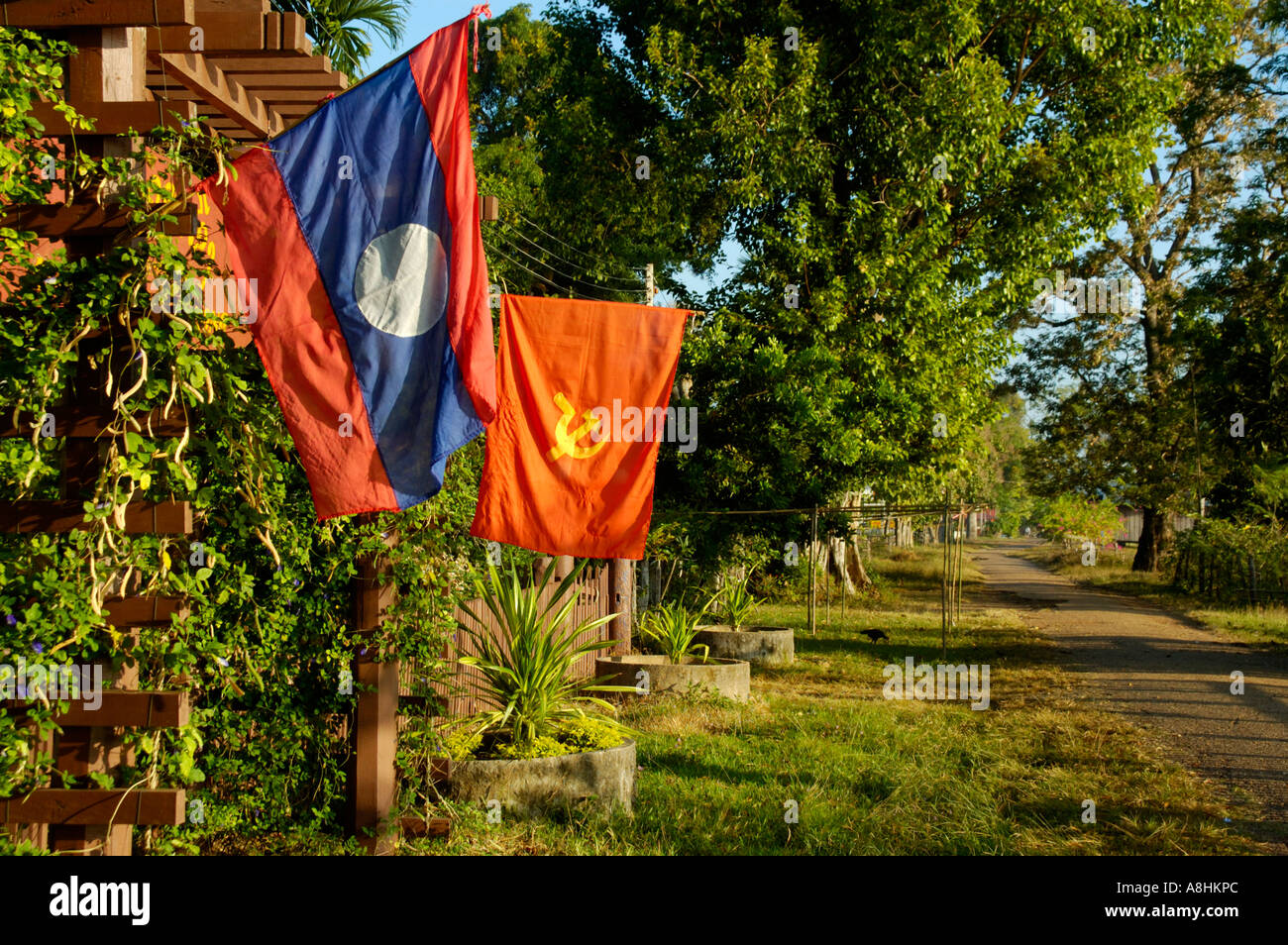 Lao and communist sovjet flag Muang Khong Si Phan Don Laos Stock Photo ...