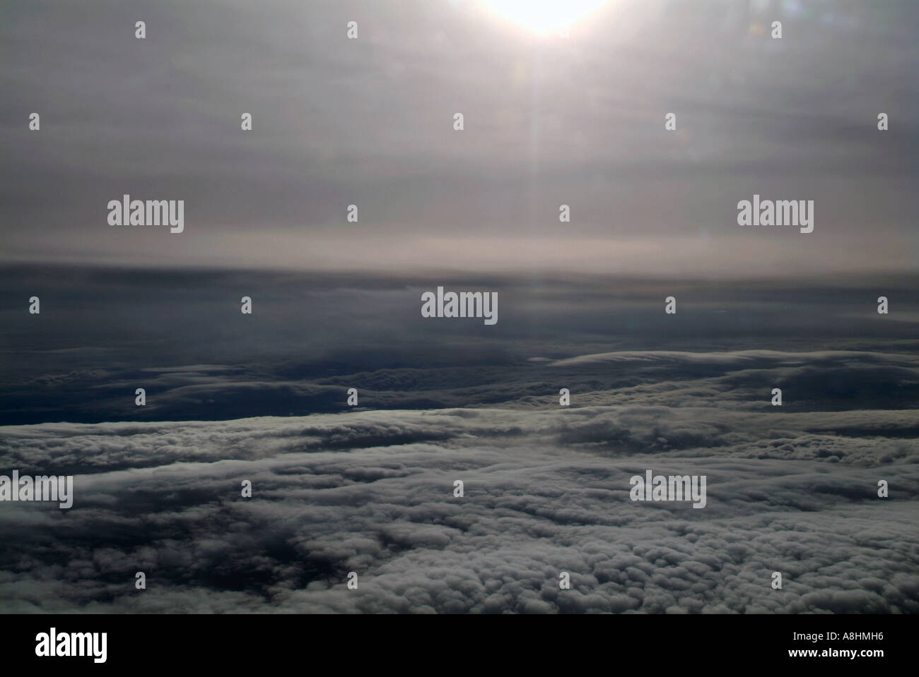 Fluffy clouds viewed from airplane hi-res stock photography and images ...