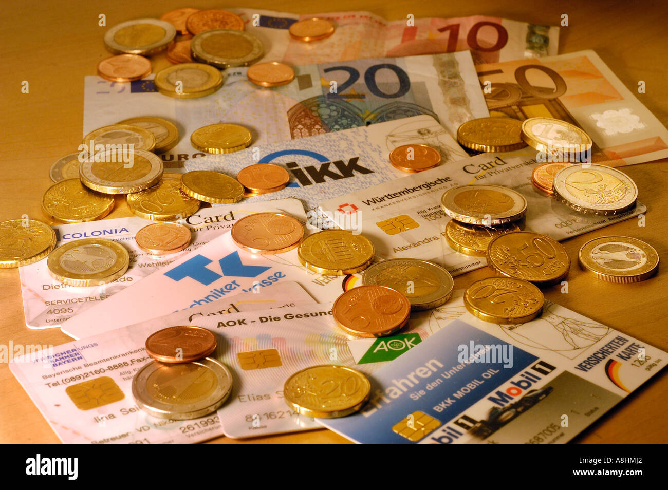 Different chip cards of German health insurance and Euro money Stock ...