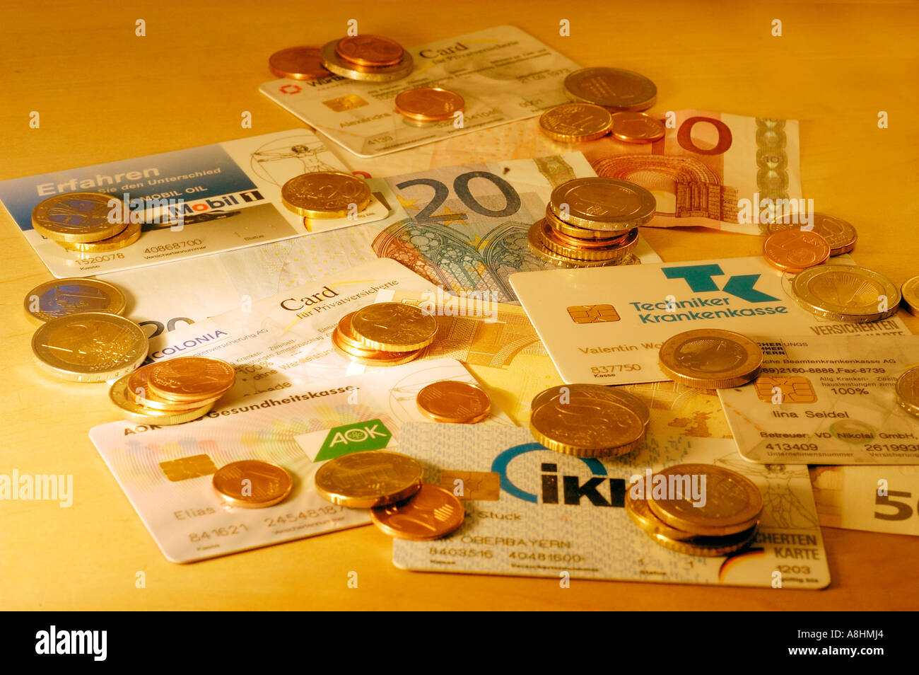Different chip cards of German health insurance and Euro money Stock ...