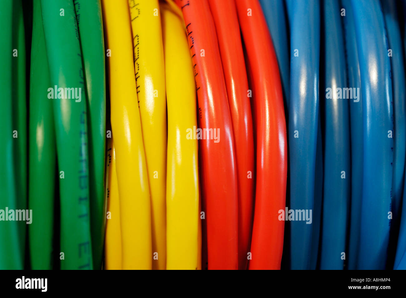 Rolled up plastic cables hi-res stock photography and images - Alamy