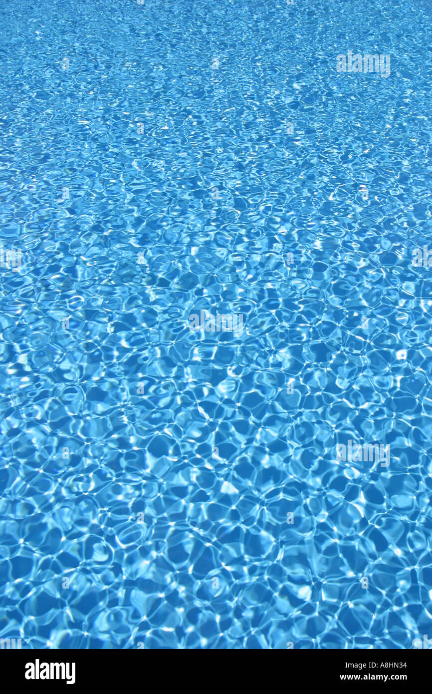 Sunshine reflecting on the surface of a private swimming pool Stock ...