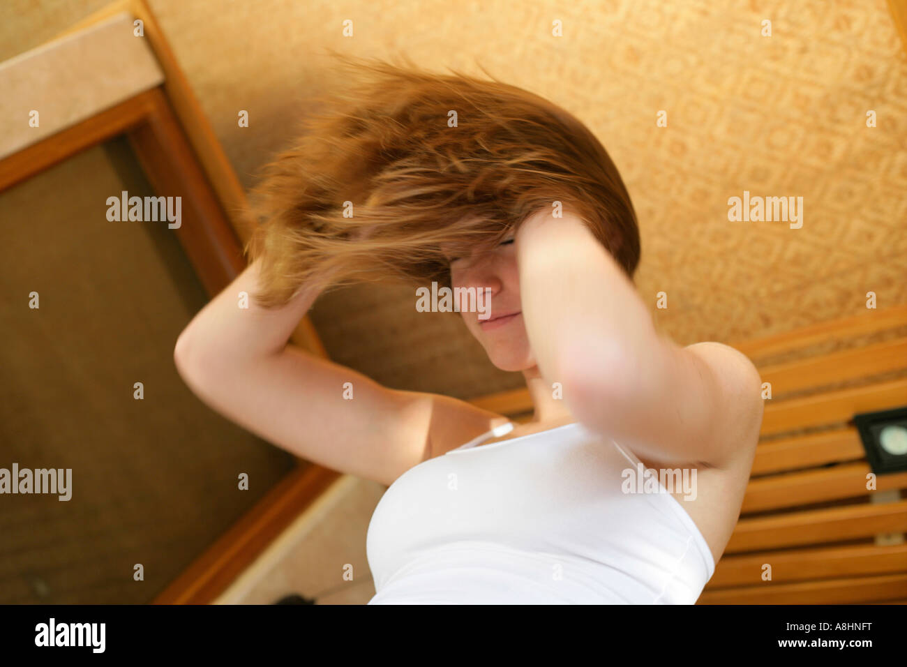 Low angle view of a young woman Stock Photo - Alamy