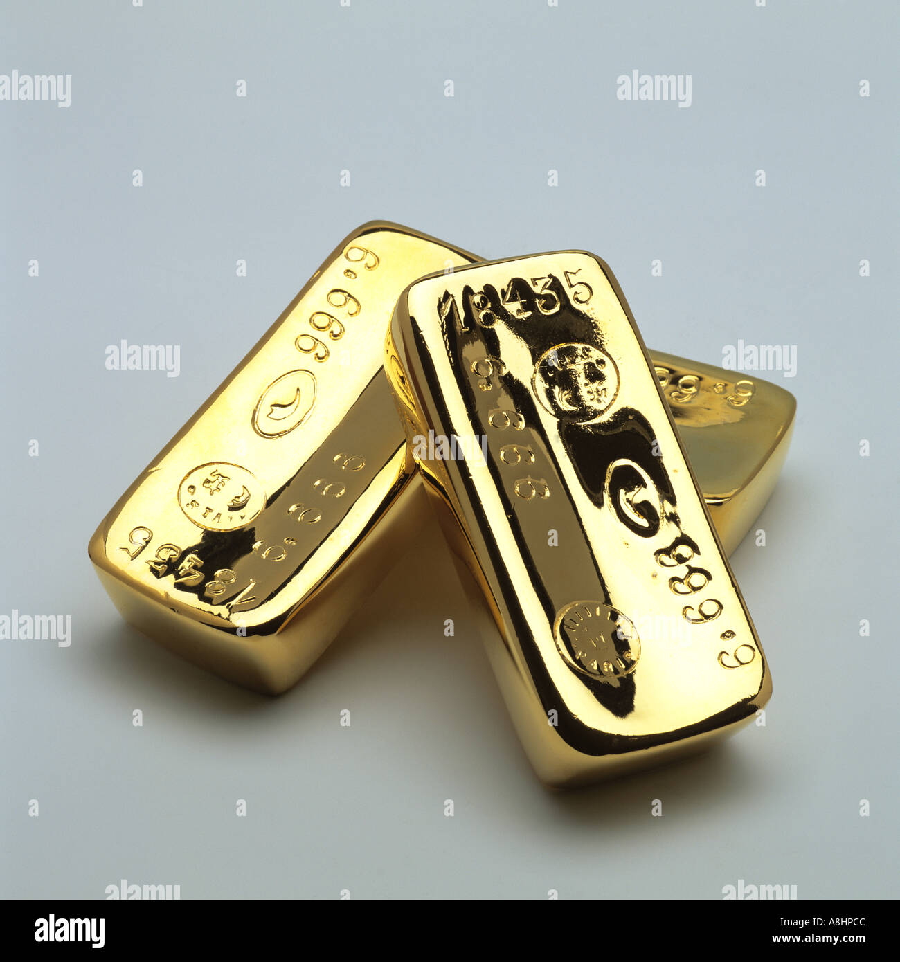 Three gold bars Stock Photo - Alamy
