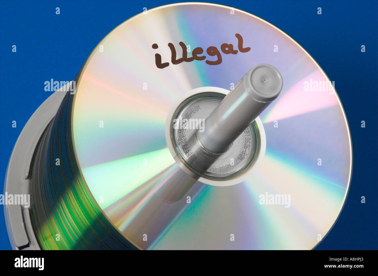 Stack of CD media labeled "illegal Stock Photo - Alamy